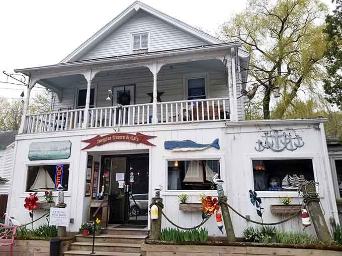 That unassuming white building with red trim is hiding some of the best burgers in Connecticut, scout's honor.