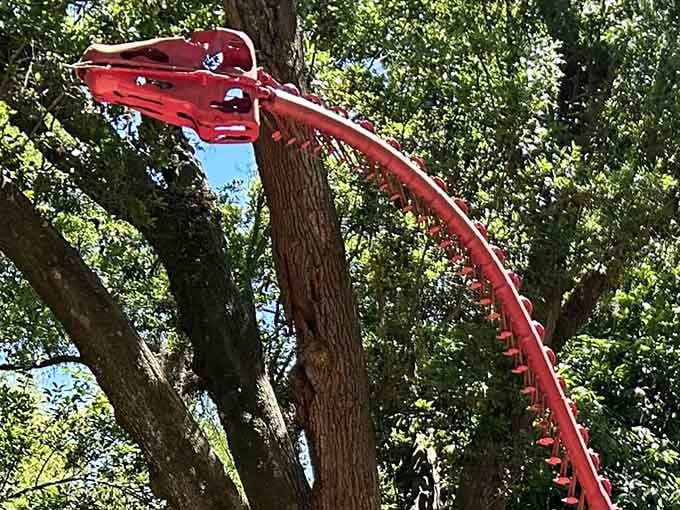 That red dinosaur skeleton soaring through the trees isn't a fever dream, it's your afternoon plans.
