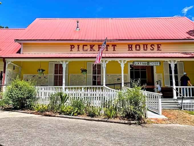 That red roof and welcoming porch aren't just charming, they're a beacon calling you to fried chicken paradise.