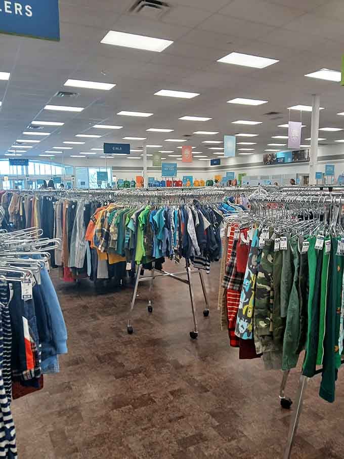 Rows of clothing stretch into the distance like a rainbow made of second chances and incredible deals.