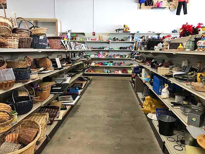 The warehouse-style layout stretches before you like a treasure map, with columns marking your path through furniture paradise.