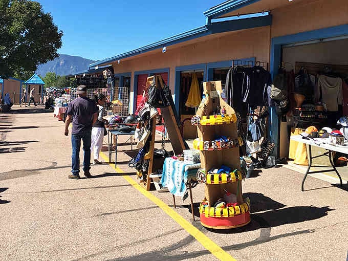 Pikes Peak watches over as treasure hunters browse tables loaded with everything from vintage finds to everyday surprises.
