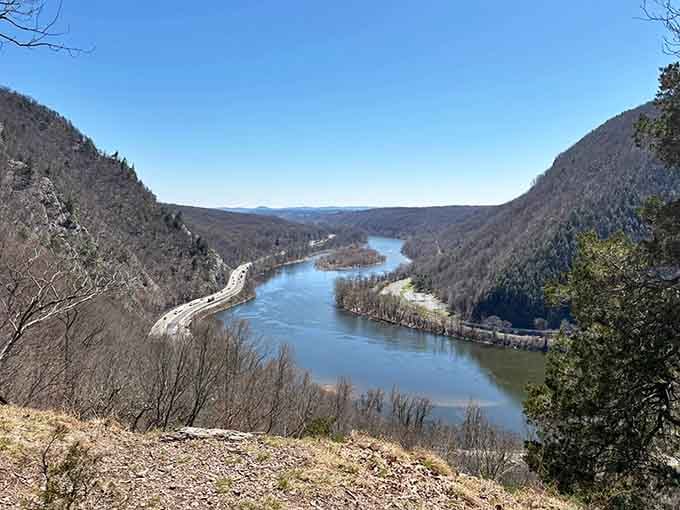 The Delaware River carving through ancient mountains like nature's own masterpiece, painted fresh every single day.