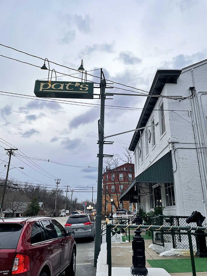 That green and white exterior isn't just charming, it's your beacon to Louisville's finest hand-trimmed steaks.