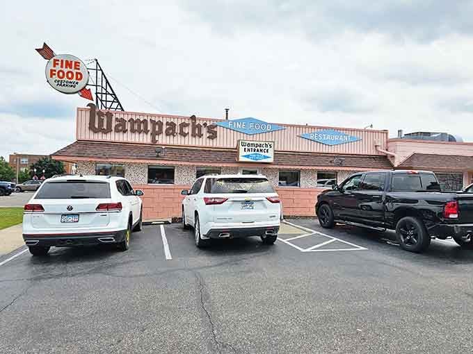 That pink exterior and vintage signage aren't trying to be retro&mdash;they just ARE, and that's the whole point.