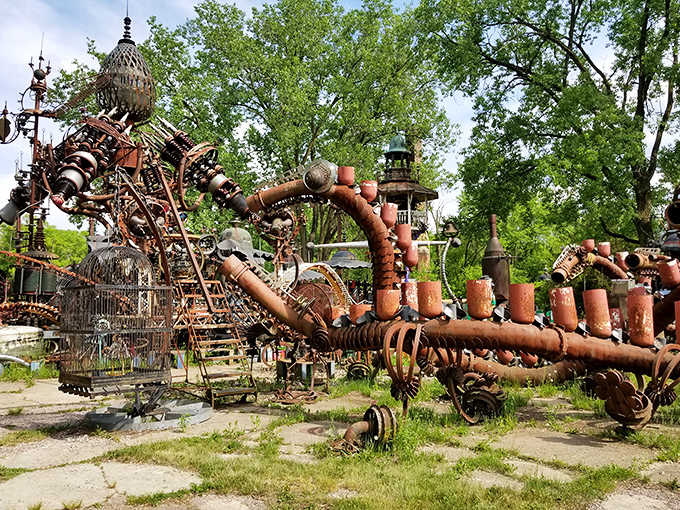 Industrial pipes twist into impossible creatures, proving one person's scrap metal is another's ticket to artistic immortality.