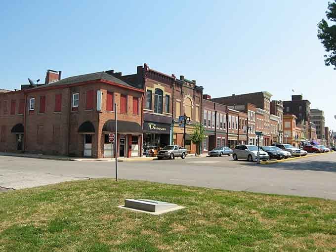 Historic storefronts line the streets where French traders once bartered, now hosting coffee shops instead of pelts.
