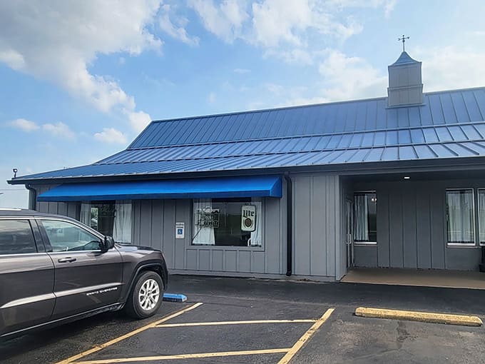 That blue awning isn't just decoration; it's a beacon guiding hungry souls to homemade pie paradise in Highland.