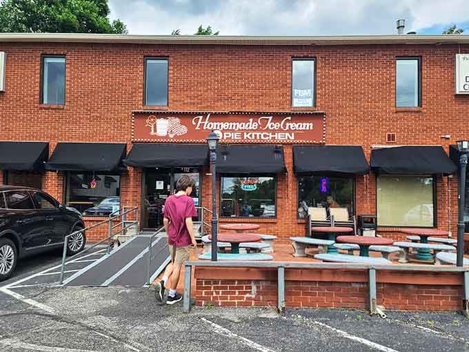 The Pie Kitchen's welcoming storefront beckons with outdoor seating and the promise of homemade goodness.