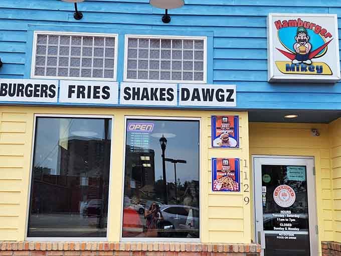 That cheerful blue and yellow exterior isn't just paint, it's a promise of happiness wrapped in wax paper.