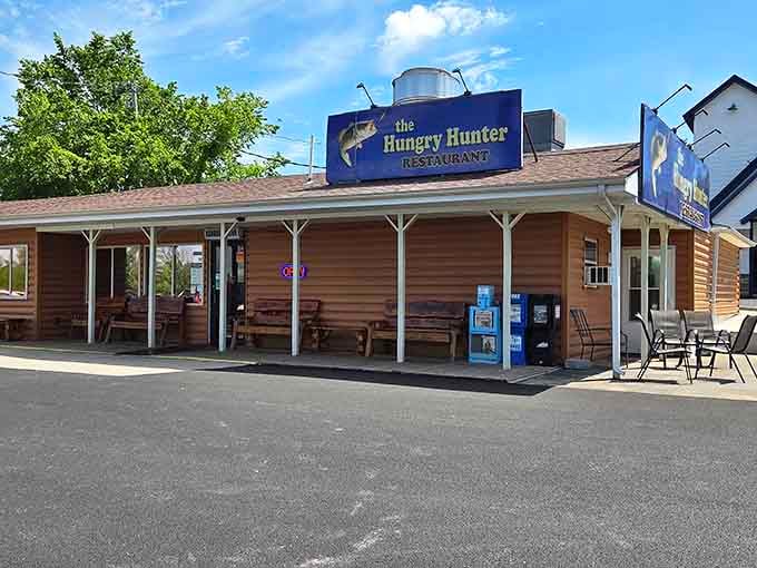 That blue bass isn't just decoration, it's a breakfast promise written in fish and wood siding.