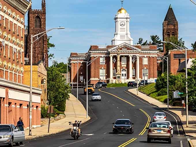 Tree-lined streets and classic architecture remind you why Connecticut towns have that timeless New England charm.