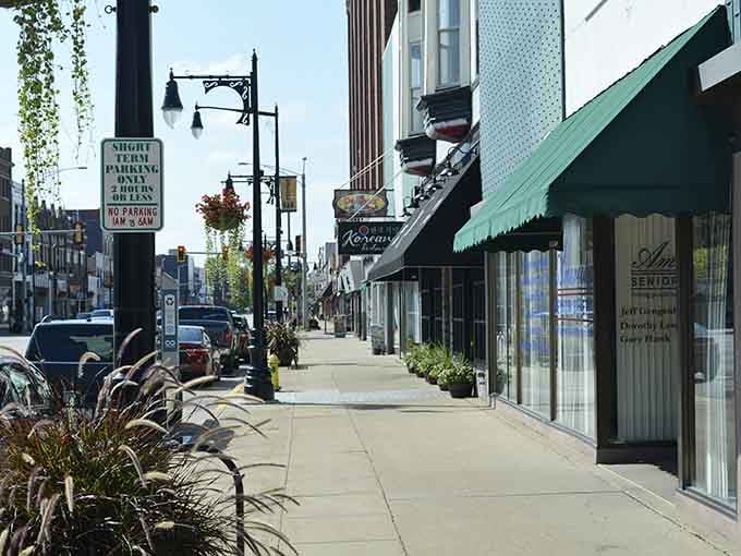 Those vintage awnings and hanging planters prove downtown doesn't need a mall makeover to stay absolutely delightful and inviting.