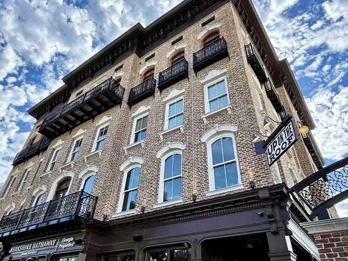 The building itself is a stunner, standing tall and proud like it knows exactly what treasures await up top.
