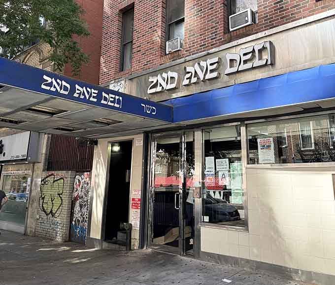That iconic blue awning isn't just signage—it's a beacon calling you to sandwich salvation in Midtown Manhattan.