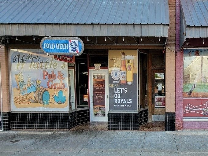 When the window says "Let's Go Royals" and promises cold beer, you know you've found your people and your next great meal.