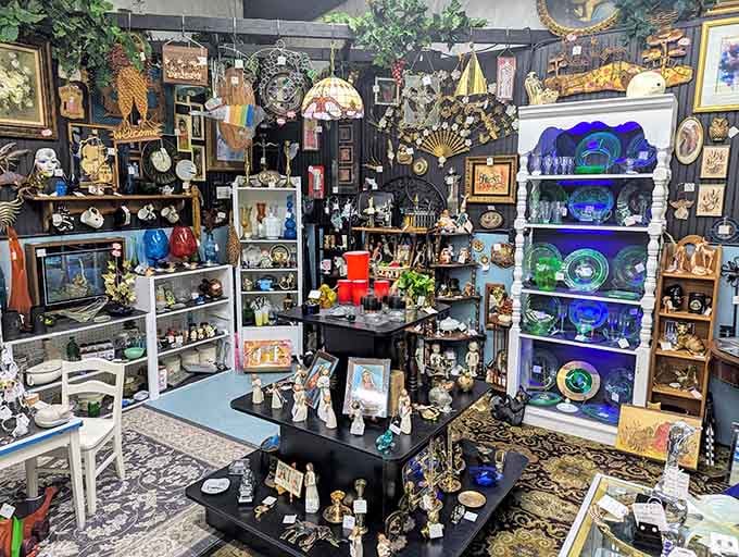 Colorful glassware catches the light while figurines and collectibles create a visual feast that changes with every glance around.