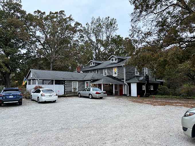 The gravel parking lot and rustic exterior promise authentic country dining that's worth every mile of the journey.