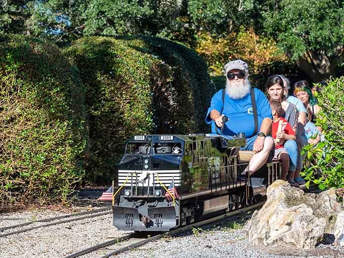 When your engineer sports a Santa beard in Florida sunshine, you know this railroad runs on pure magic.