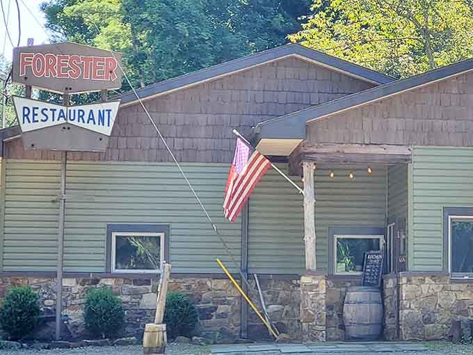 That vintage sign and stone foundation whisper promises of comfort food worth the scenic drive through Pennsylvania's backroads.