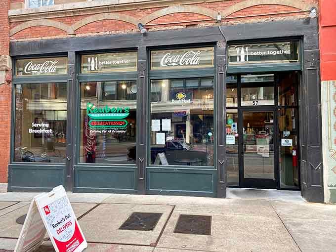 That vintage Coca-Cola signage and classic storefront whisper promises of old-school deli magic hiding behind those downtown Atlanta doors.