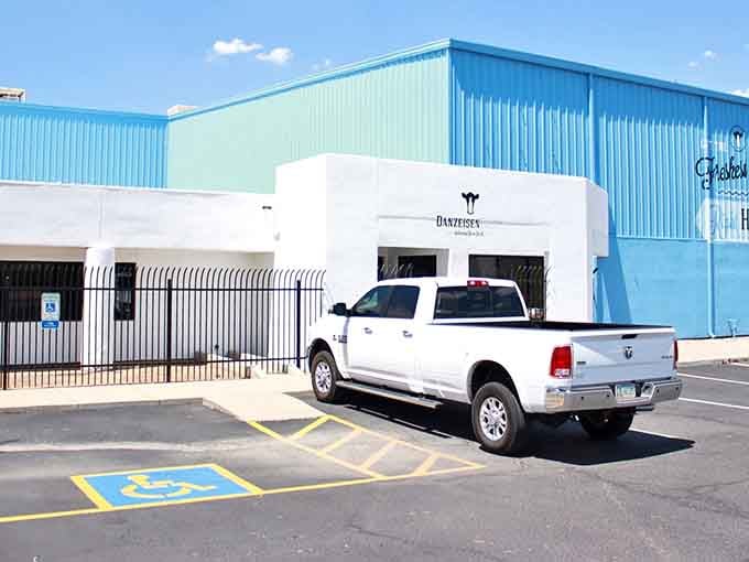 That cheerful blue exterior promises something special inside, like finding a dairy oasis in the desert.