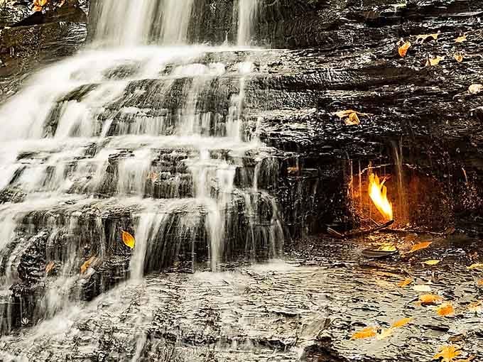 Nature's ultimate magic trick: a real flame flickering behind rushing water, defying everything your science teacher ever taught you.