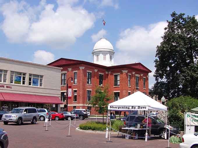 That distinctive white cupola of the Old McHenry County Courthouse rises above the square like a beacon guiding you to small-town charm and good times.