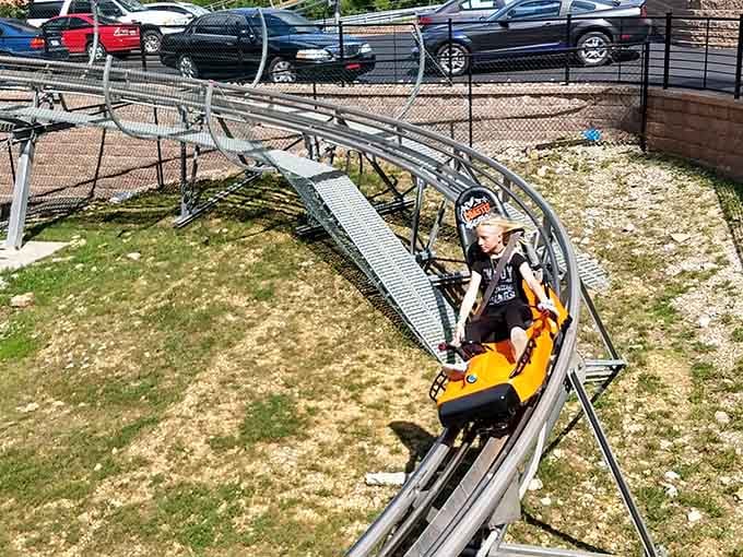 Orange carts wind through Missouri woodland like a ribbon of pure adrenaline wrapped around the mountainside.