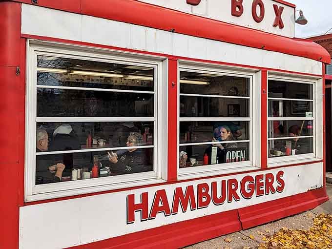 That red and white striped exterior isn't just charming, it's a beacon calling you home to breakfast.