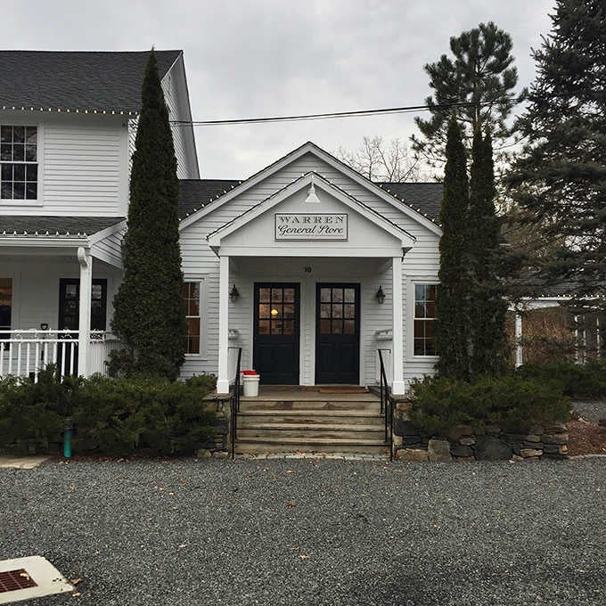 That classic white clapboard exterior isn't just for show; it's your first hint that something special awaits inside.