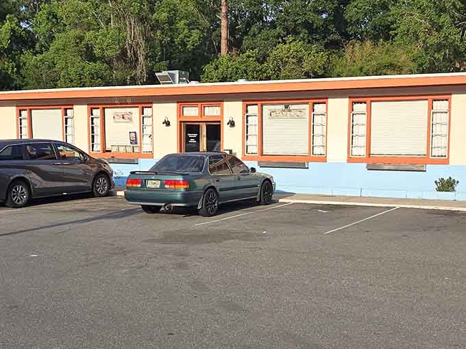 The cheerful orange and blue exterior promises comfort food and good times, just like your favorite sitcom.