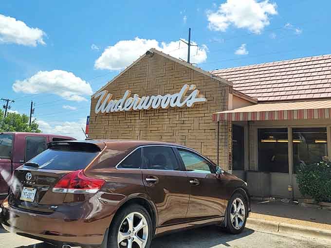 That classic script sign isn't just marking a building, it's pointing you toward your next great meal.