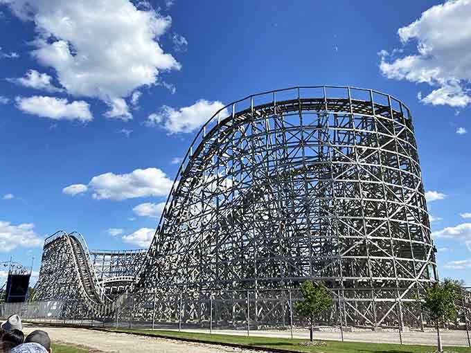 That magnificent wooden structure against the blue sky proves thrills don't need to cost a fortune.
