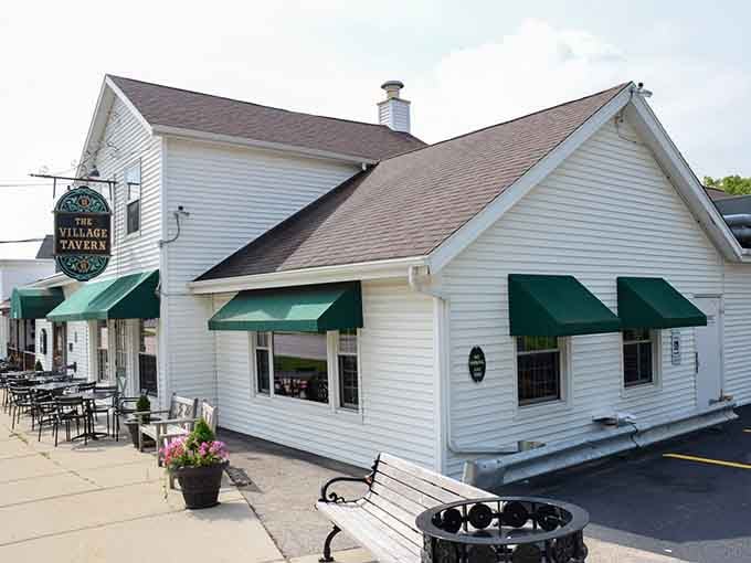 White clapboard charm meets green awnings in Long Grove's most historic watering hole, standing proud since before Prohibition.