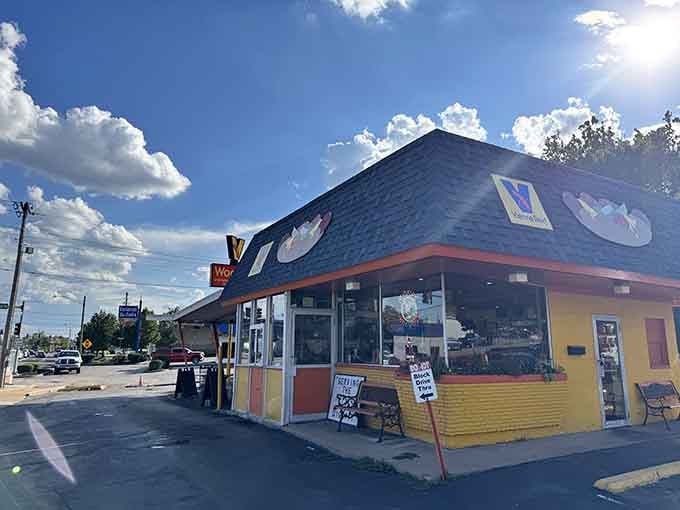 The distinctive blue roof and cheerful colors make Woofies impossible to miss, like a beacon of deliciousness guiding hungry travelers home.