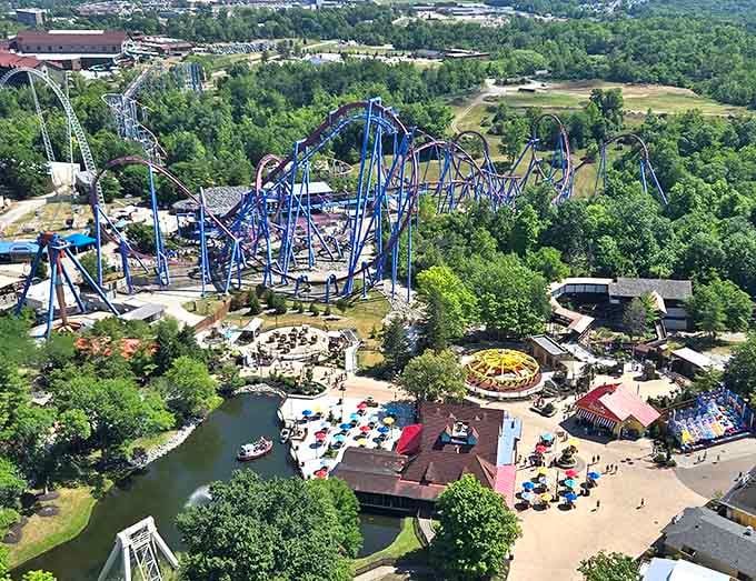 From above, the twisted blue steel and cheerful umbrellas create a playground that makes retirement look like the perfect time.