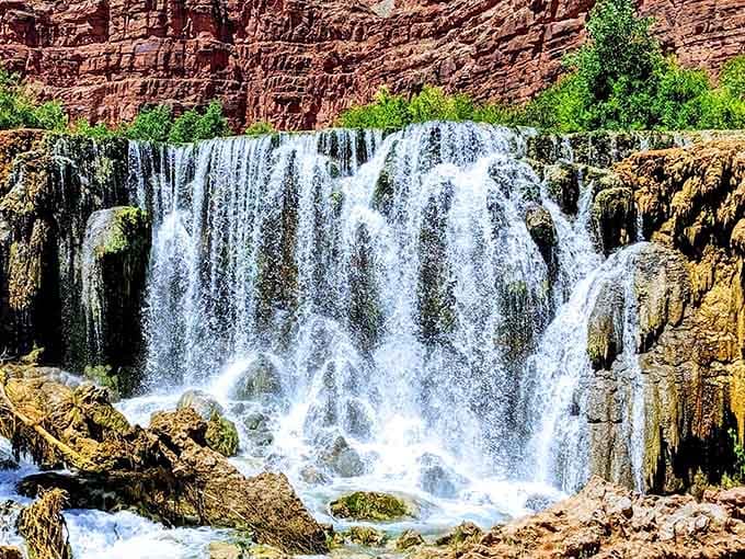 That turquoise water cascading over ancient travertine looks like Mother Nature showing off her interior design skills.