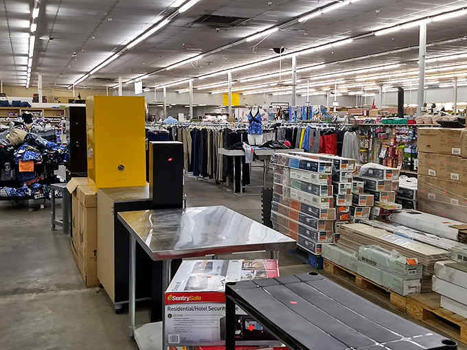 Inside The Liquidators, where organized chaos meets bargain hunter's paradise in one glorious warehouse sprawl.