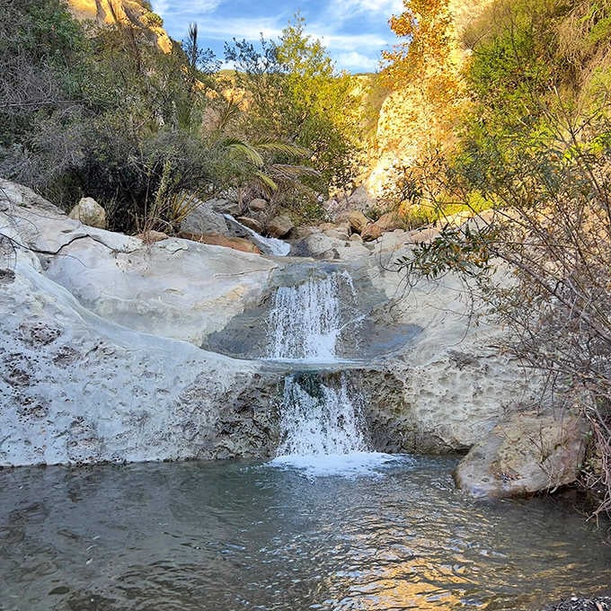 Golden hour transforms these cascades into liquid sunshine, proving timing really is everything when chasing California waterfalls.