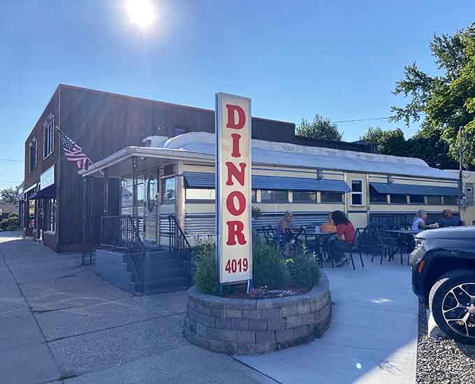 When a vintage diner's towering sign catches the sunlight just right, your GPS suddenly becomes completely unnecessary for navigation.