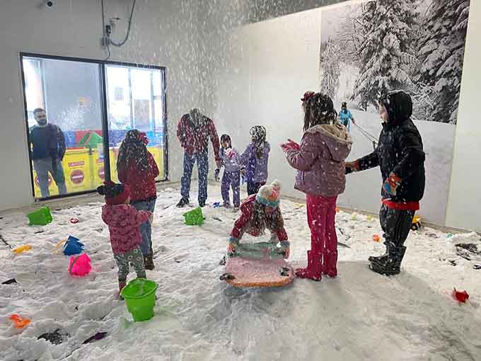 Snow falling indoors while it's blazing hot outside? Texas just broke the rules of nature, and we're here for it.