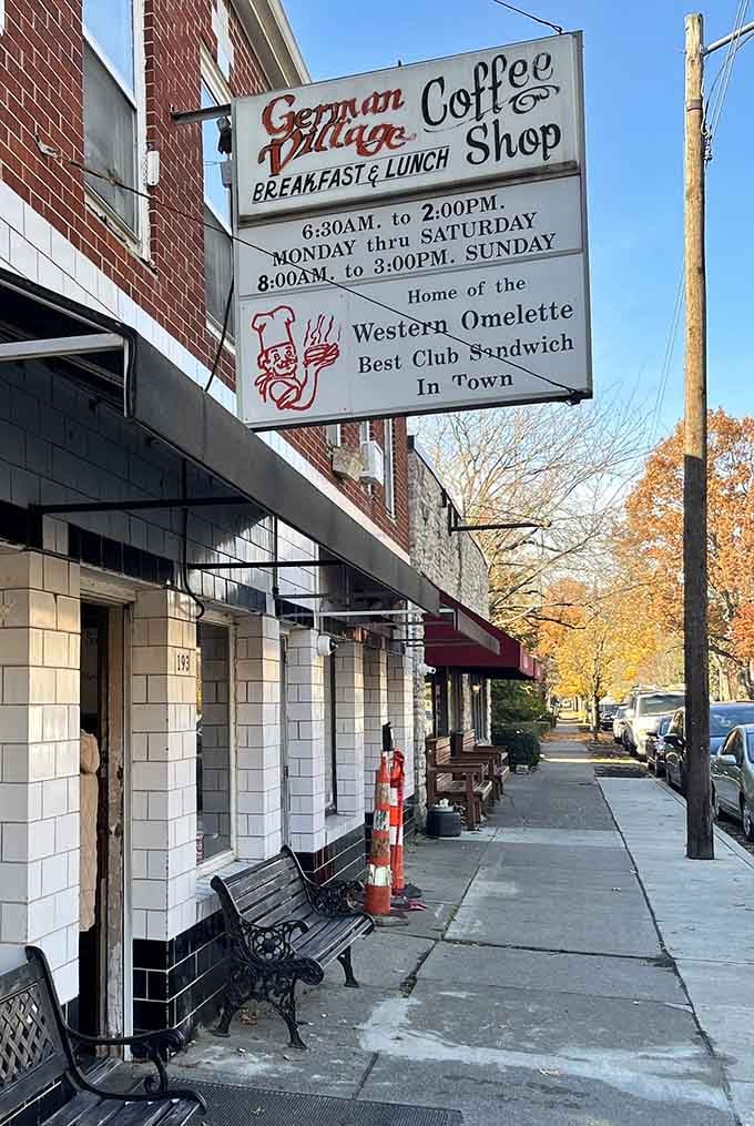 The sign promises Western omelets and club sandwiches, but those pancakes are the real headliners here.