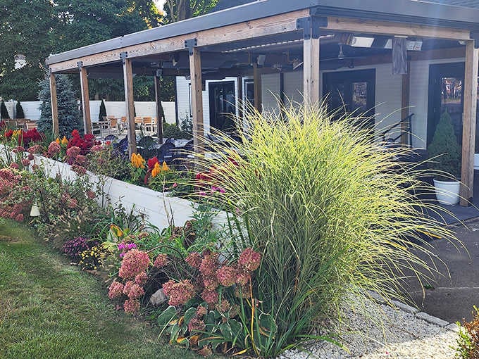 Colorful gardens frame the entrance to Connecticut's answer to dining done right, no pretension required here.