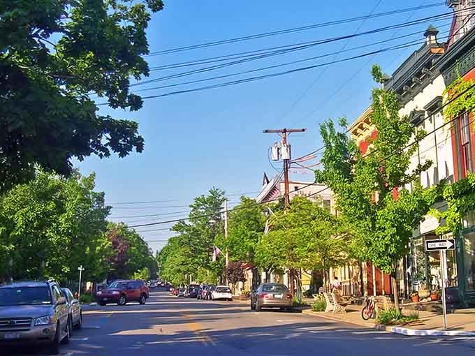 Tree-lined perfection meets small-town charm where every storefront deserves its own Instagram account.