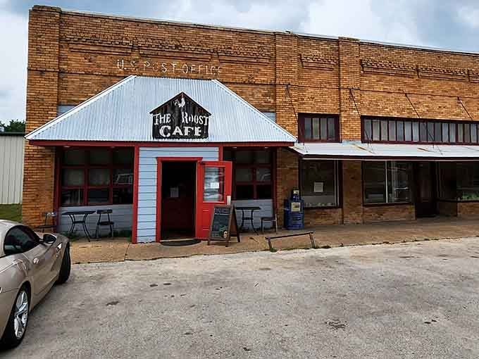 The red door beckons like a beacon of biscuits and gravy, promising morning comfort in every bite.
