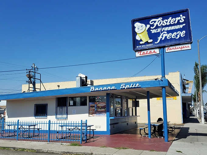 That vintage pole sign towers over the building like a beacon of happiness, calling to anyone craving soft-serve perfection.