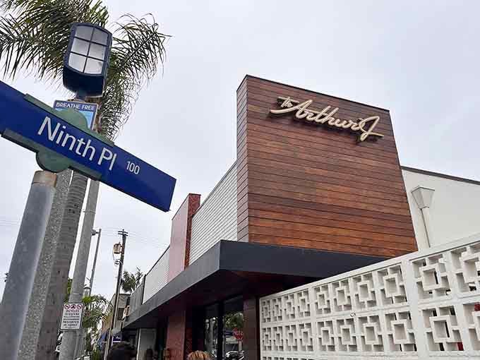 The Arthur J stands proud on Ninth Place, looking like it time-traveled straight from 1965's coolest dinner party.