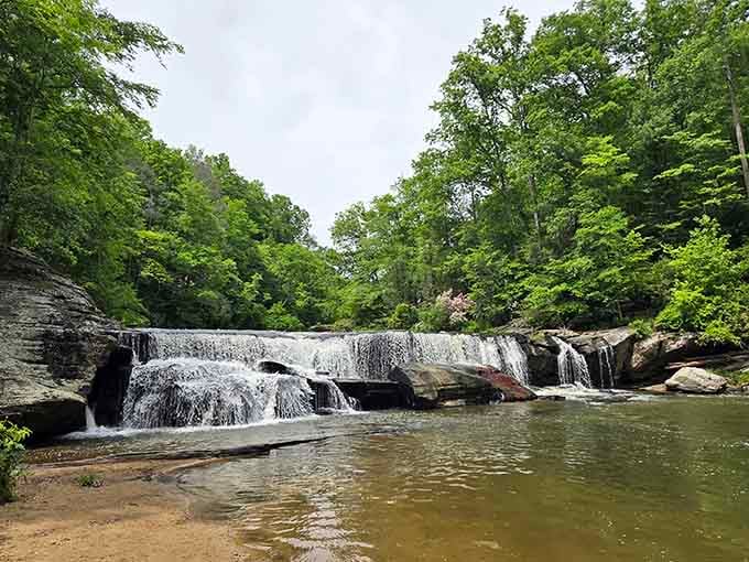 That sandy beach paired with cascading water isn't a mirage, it's your new favorite swimming spot.
