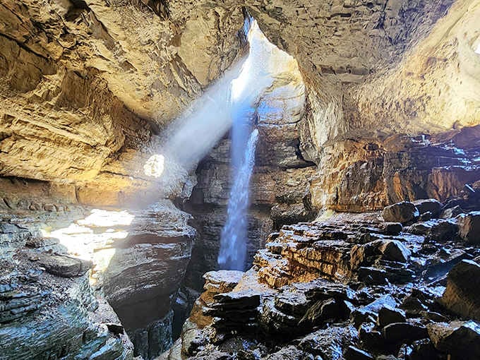 That magical beam of light cutting through the mist is what makes Stephens Gap one of Alabama's most photographed underground destinations.